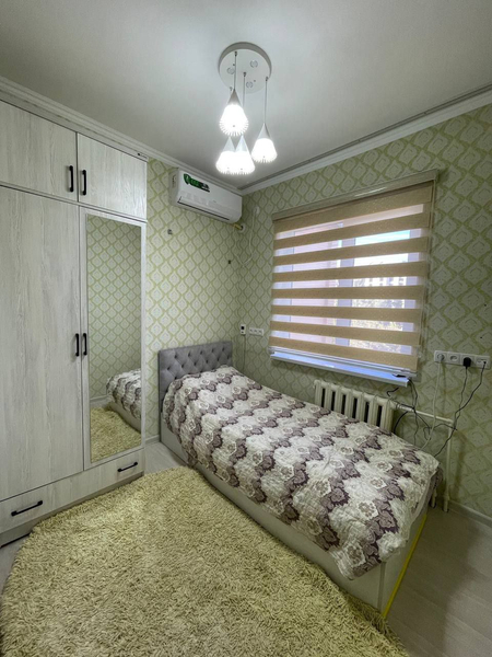 Продажа 2/4/5 на массиве Ахмад Югнакий ТТЗ, средний ремонт-чистая, бал