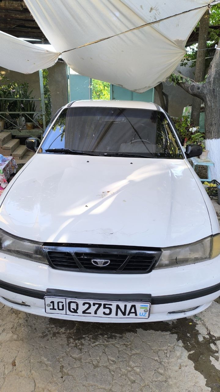 Nexia 1 yili 2001