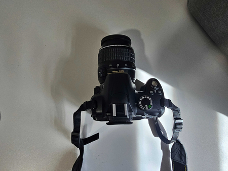 ПРОДАМ Nikon D3000 Зеркальный фотоаппарат / Объектив 18-55mm.