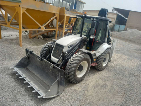 Экскаватор погрузчик Hidromek HMK102S с гидромолотом