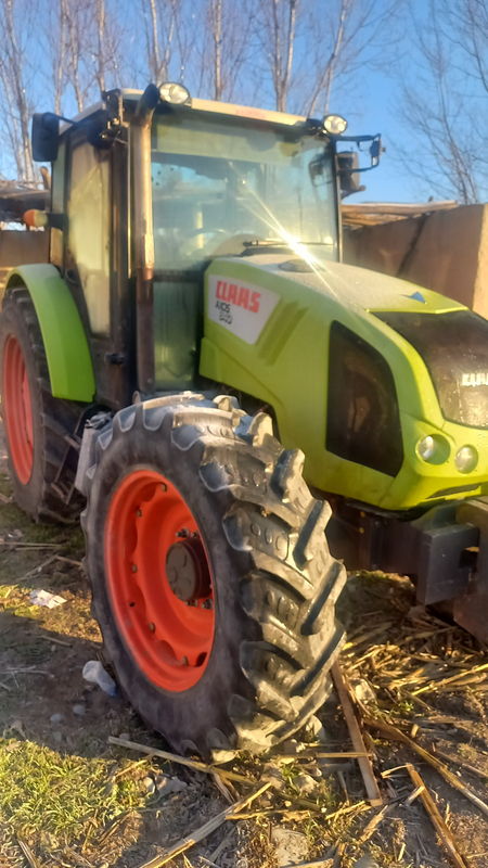 Трактор клаас ахос 340