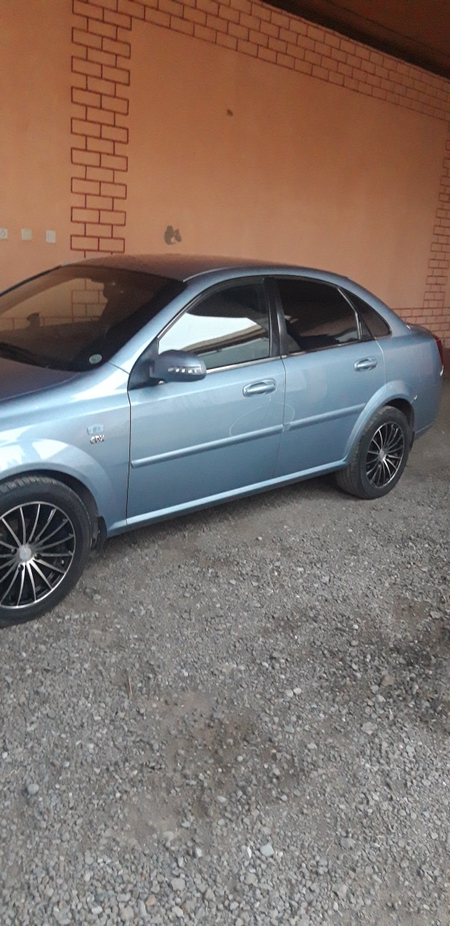 lasetti 2 padisa 2013 yil 86000 km