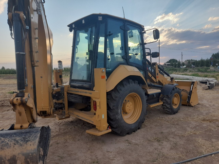 Продается экскаватор погрузчик caterpillar