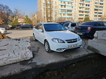 Lacetti 2013 oq 1,8 gentra qilingan