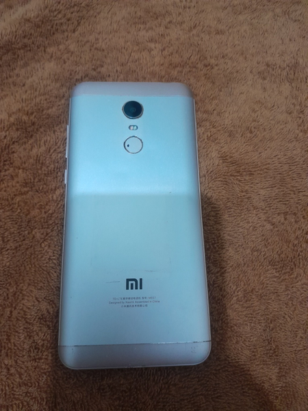 Redmi  5 bir oy kafolati bilan