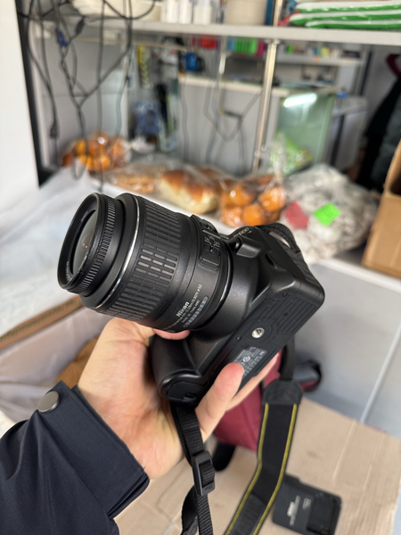 Nikon D3100 juda yaxshi holatda