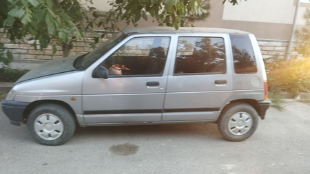 Tico , holati o'rta . Kulrang