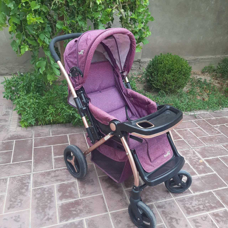 Детская прогулочная коляска Goodbaby.