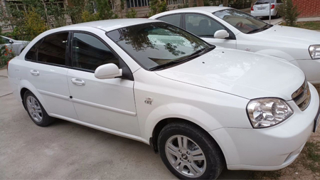 lasetti 2 pozitsiya 2010 yil oq metani bor 151000 km yurgan
