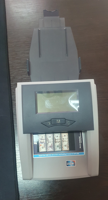 Dollar tekshiradigan Apparat
