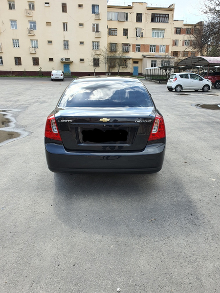 Lasetti 1.8 2012 yurgani xalol 152000 narxi 10500