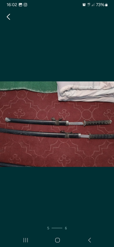 Qilich xanjari bilan