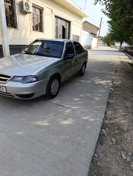 Nexia 2  1.6 luks kansaner 2009 yil metani bor matori qilingan