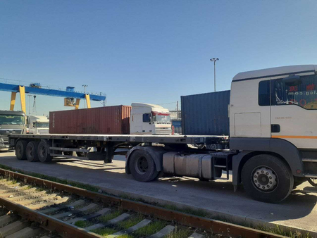 Uz MAN 19.400 ва прицеп UzAuto Trailer бортли контейнеровоз 2в1