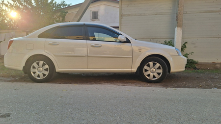 Lacetti 1.8.          ..