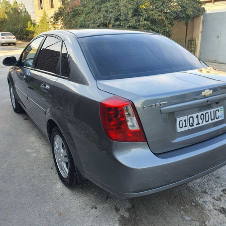 Продается Lacetti 2013 г.в. цвета Мокрый Асфальт. Родная краска.