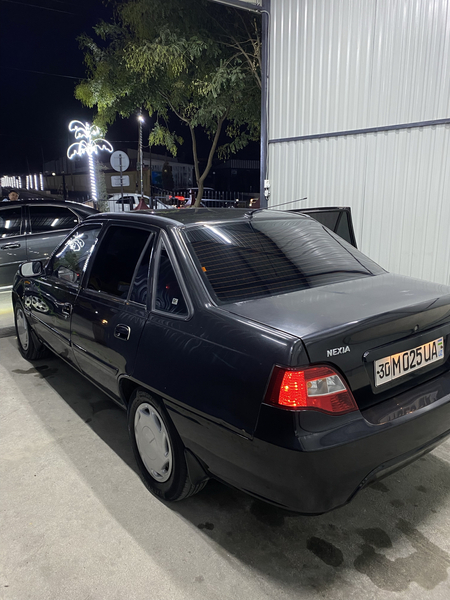 Nexia 2 qora 2014