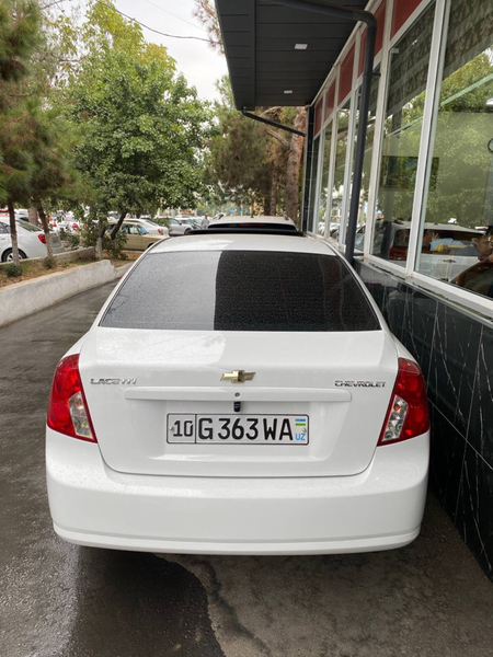 Lacetti 2013 yurgan 84.500 Avtamat benzin realni oladganla tel qlila
