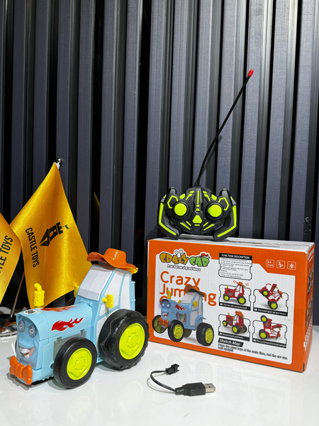 Танцующий трактор на пульте управления.Castle Toys uz