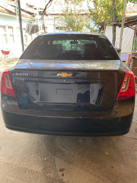 Продам авто Chevrolet Gentra черный (полная комплектация)