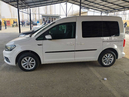 Volkswagen Caddy oilabop pul topar moshina (7kishilik)
