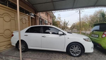 Tayota.1.8 aftamat.holati ideal.kicikina petno bilimidigan.rashod.8ta