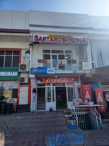 Magazin va sartaroshxona
