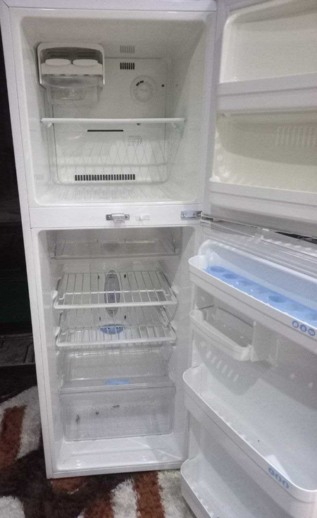 Продаётся холодильник почти новый и новая коляска