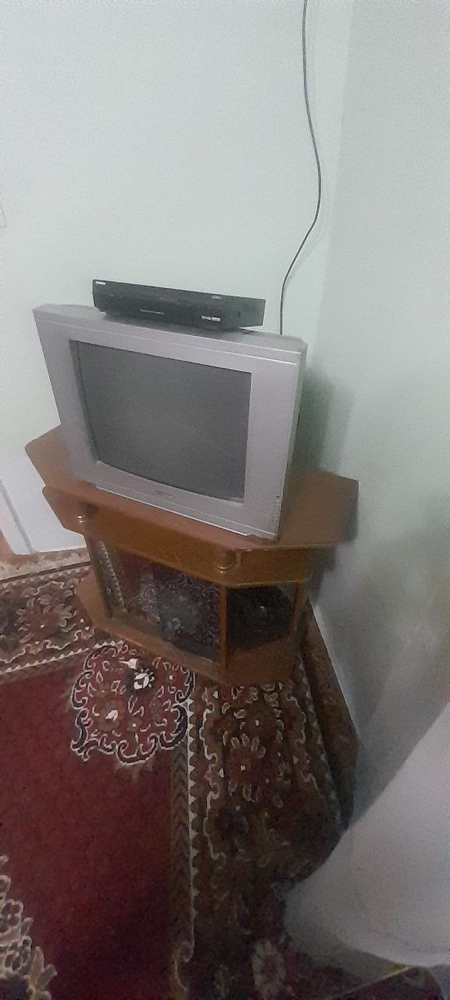 Телевизор с стеклянный поставкой