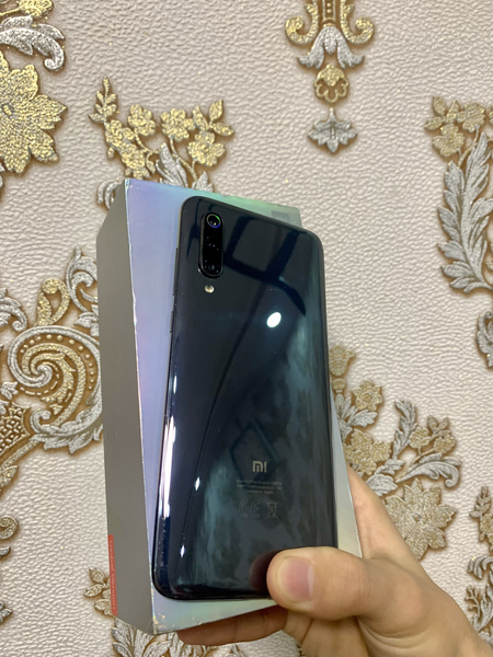 Mi 9 128 GB ideal hich qati alishmagan karobka dokument