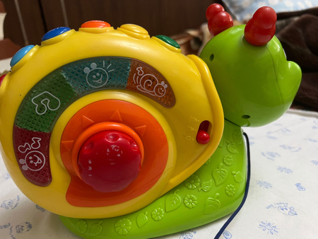 Улитка Chicco музыкальна на колесиках