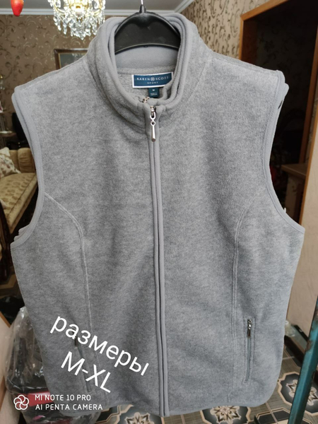 Безрукавки женские