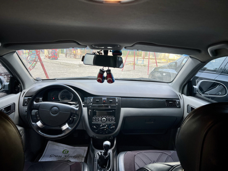 Lacetti-2011г. 2-поз. В идеальном состоянии не битая не крашеная
