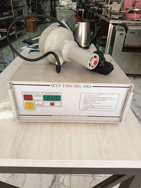 Qo'lda elektromagnit induktsiya F300 fotomagnit plastik mashinasi