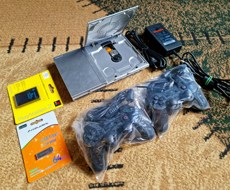 Playstation 2 slim kulrang