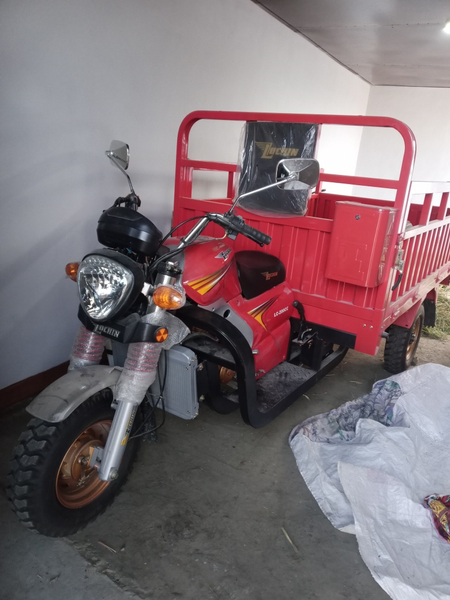 Lochin motosekil 1500 kg guruz 2 most likely yangi nomer olingan