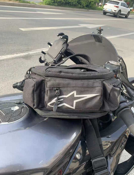 Moto sumka bolar VA qizlaga