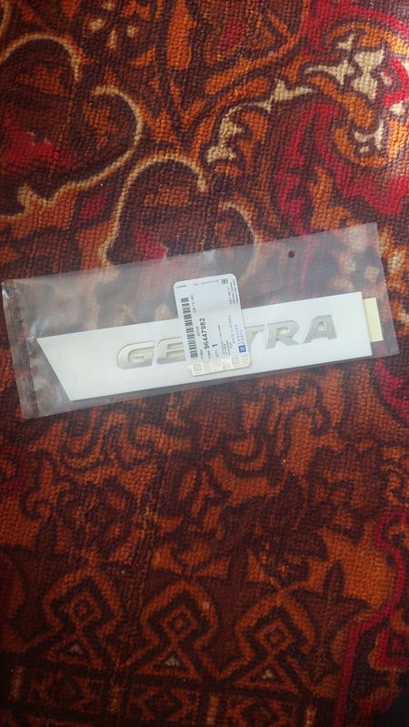 Оригинал GM надпись GENTRA