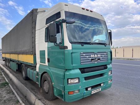 Ман тга 2000 прицеп 1999 цена 28000$ оладигонла тел клила келишамиз