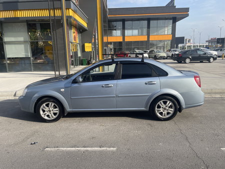 lacetti 1.8 sotiladi gazi bor 2011 yil