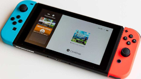 Nintendo Switch with Neon Blue and Neon Red Joy-Con