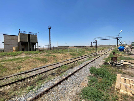 Продам Землю в РК с ЖД веткой,17 км от Ташкента складские помещения RR