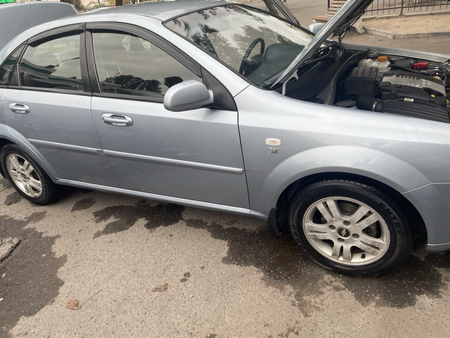 Lacetti 2012 года