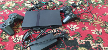 Playstation 2 slim 50ta o'yini bilan