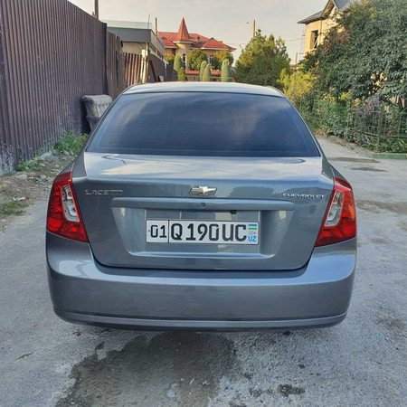 Продается Lacetti 2013 г.в. цвета Мокрый Асфальт. Родная краска.