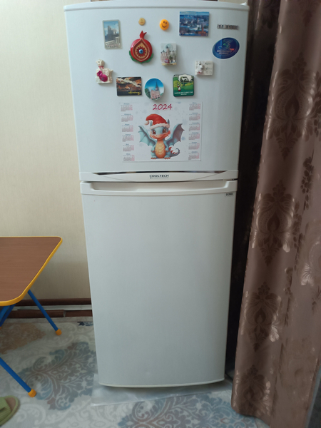 Холодильник работает