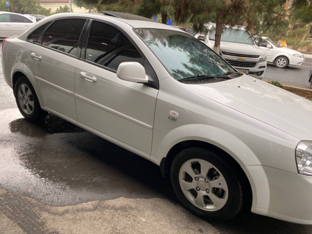 Lacetti 2013 yurgan 84.500 Avtamat benzin realni oladganla tel qlila