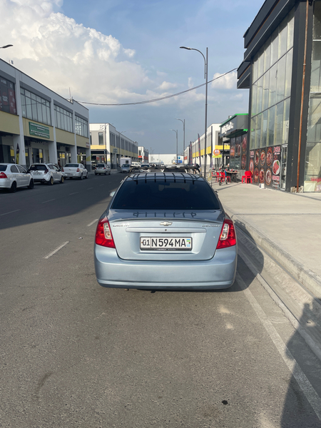 lacetti 1.8 sotiladi gazi bor 2011 yil