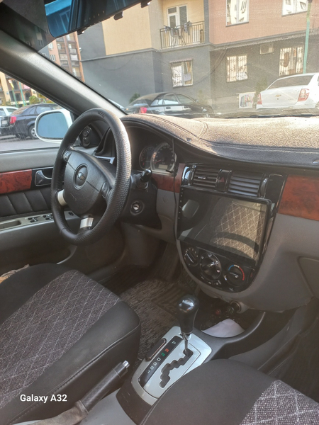 Lacetti 2009.  1.8 avtomat karobka.