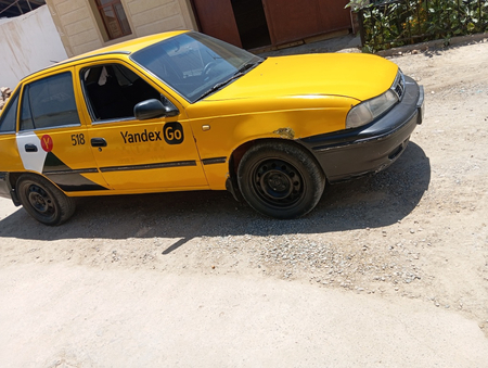 Nexia 1 yili 2003 sons tramblyor sariq